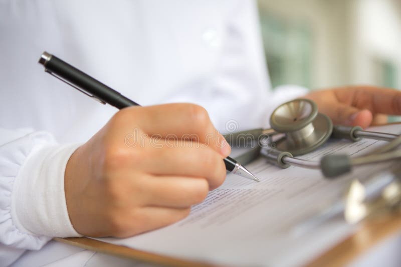 Hand Writing In Open Book On Table Stock Image - Image of object ...