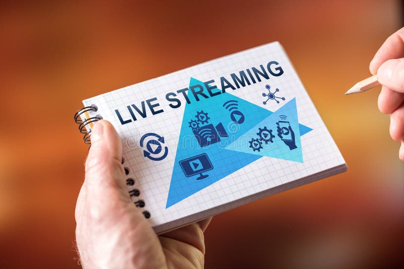 Live Streaming Concept on a Notepad Stock Photo - Image of hand ...