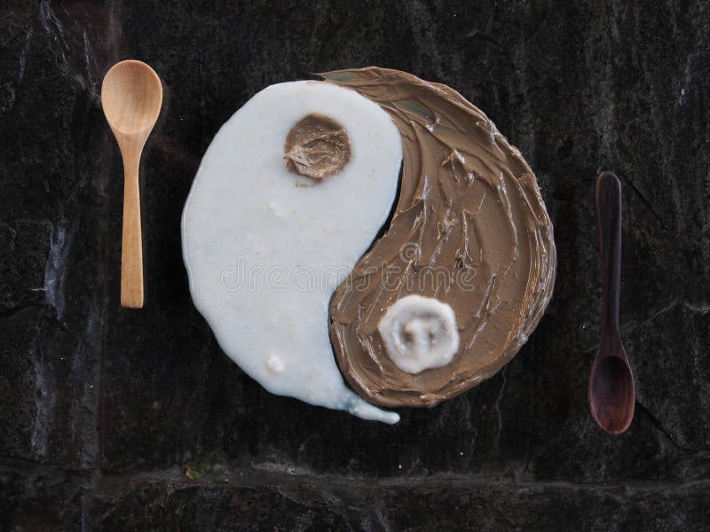 Hand Drawing of Mud and Rice on the Glass As Yin and Yang Stock Photo ...