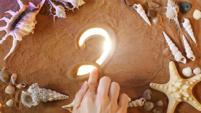 Hand Drawing Number Two 2 Symbol in the Sand. Beach Background Stock ...