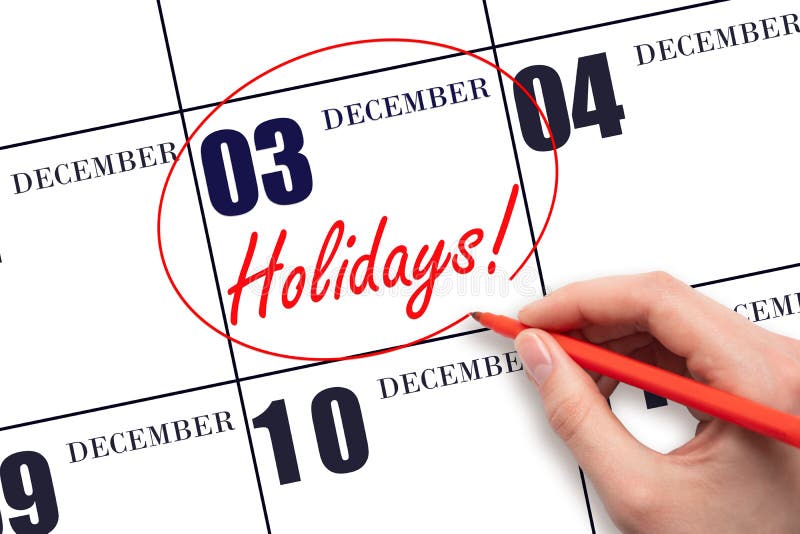 Hand Drawing a Red Circle and Writing the Text Holidays on the Calendar ... Hand Drawing a Red Circle and Writing the Text Holidays on the Calendar ...