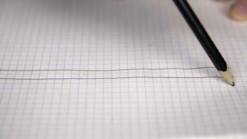Drawing a Straight Line Across Paper with a Yellow Pencil Stock Video ...