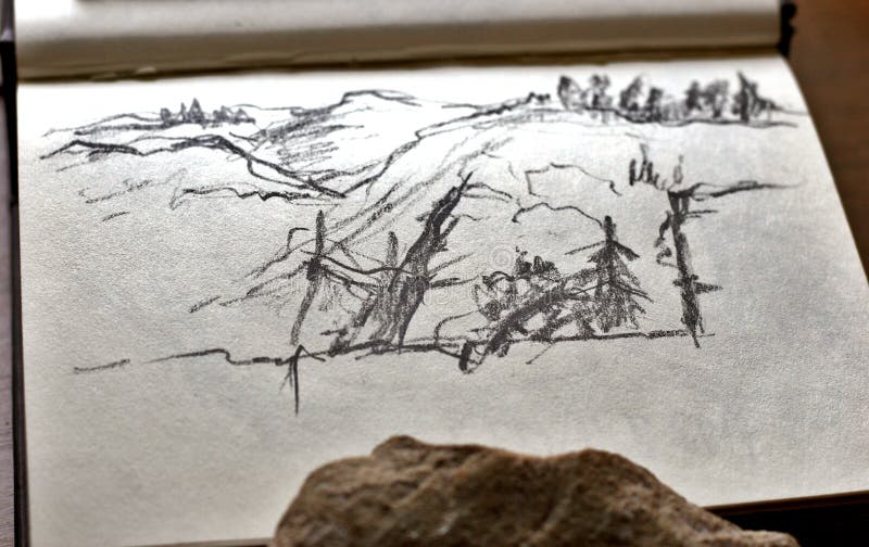 Hand-Drawn Landscape Sketch in Open Notebook, Slanted Perspective Stock ...