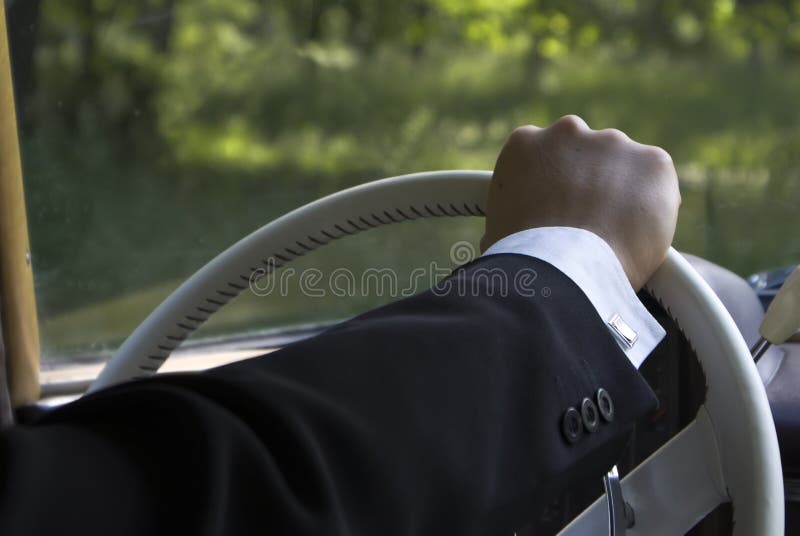 Hand of the driver stock image. Image of cufflink, retro - 10319815