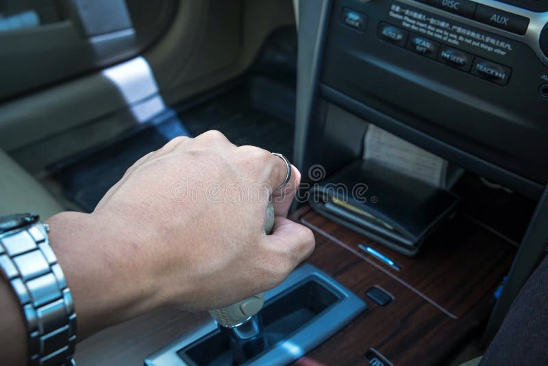 Hand of Driver Shifting Gear of Automatic Car Stock Photo - Image of ...