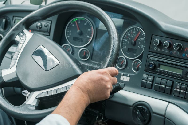 Hand of a Driver on Steering Wheel at Intercity Coach Bus. Focus on ...