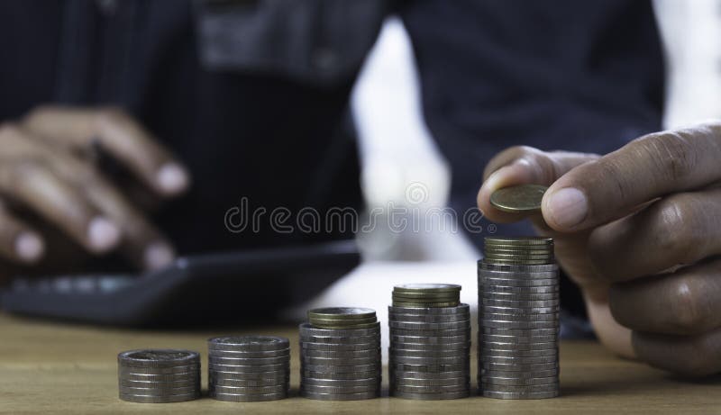 Hand Drop a Coin with Money Coin Stack Growing for Business. Financial ...