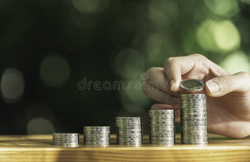 Hand Drop a Coin with Money Coin Stack Growing for Business. Financial ...