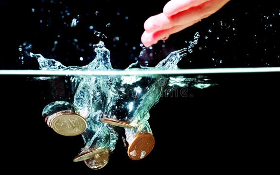 Hand Drops Some Coins in Water on Black Stock Image - Image of sinking ...