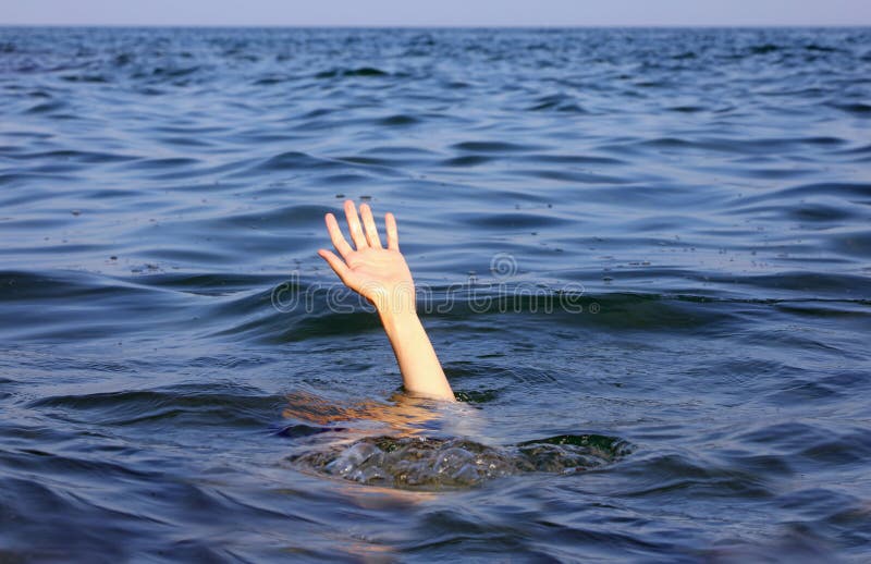 Hand Reaching Out Of Water