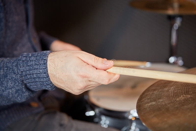Hand of Drummer with Drumstick Stock Photo - Image of drumstick, copper ...