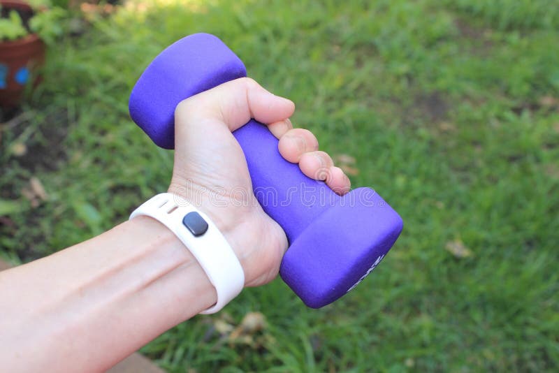 Hand and dumbbell stock image. Image of muscle, active - 90417813