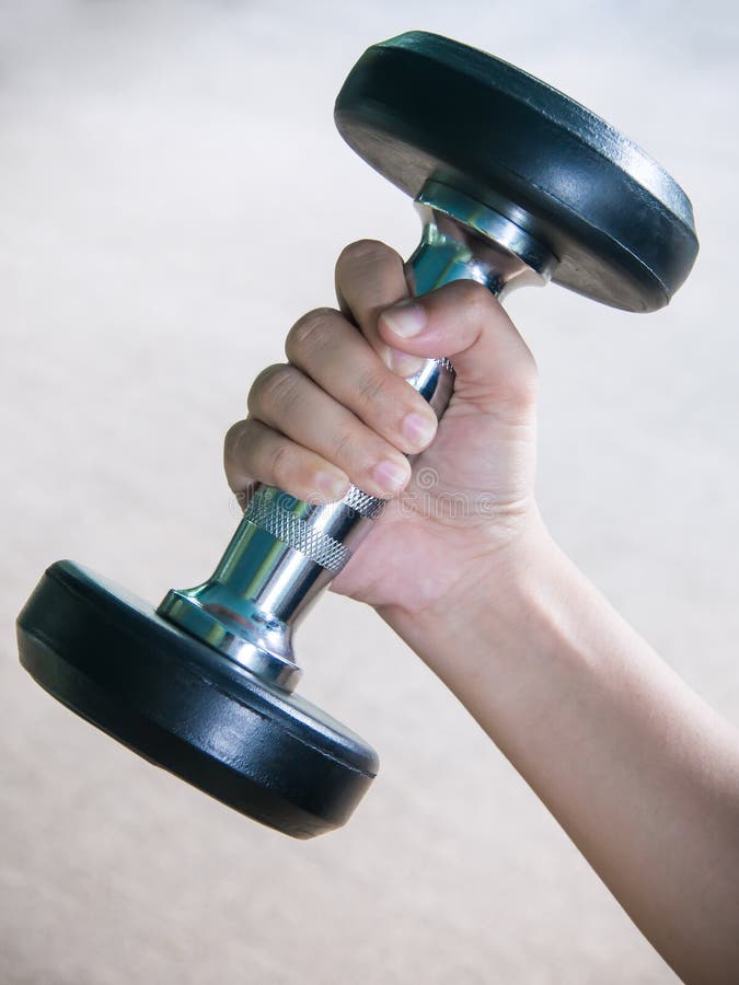 Hand with dumbbell stock image. Image of lifting, sport - 36912443