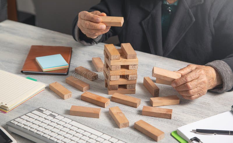 Hand of Elderly Woman Stacking Wooden Blocks Stock Image - Image of ...