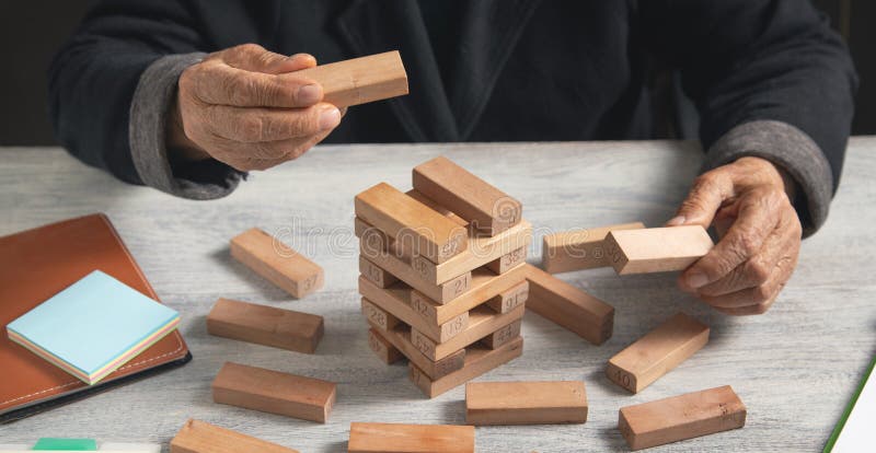 Hand of Elderly Woman Stacking Wooden Blocks Stock Photo - Image of ...
