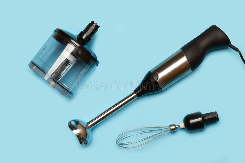 Hand Electric Blender and Accessories on a Light Blue Background with ...