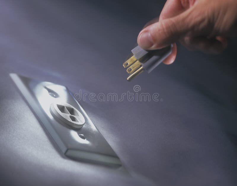Hand with Electric Plug and Outlet Stock Image - Image of person ...