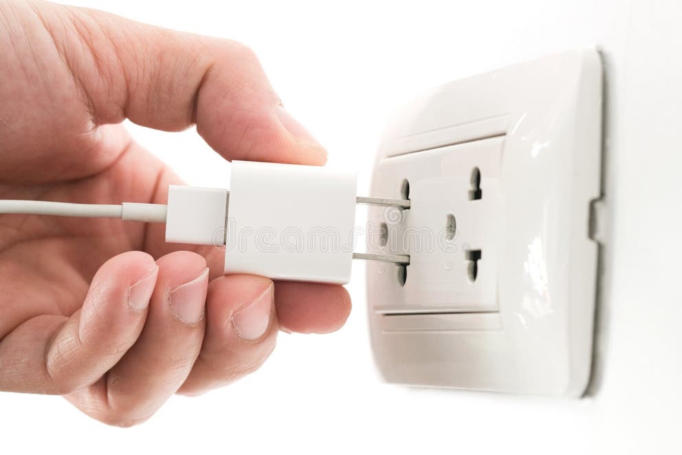 Hand of Electrical Appliances he Was Pulling the Plug. Out of the Plug ...