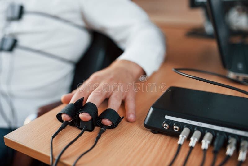 Man S Hand with Polygraph Electrodes Stock Image - Image of criminal ...