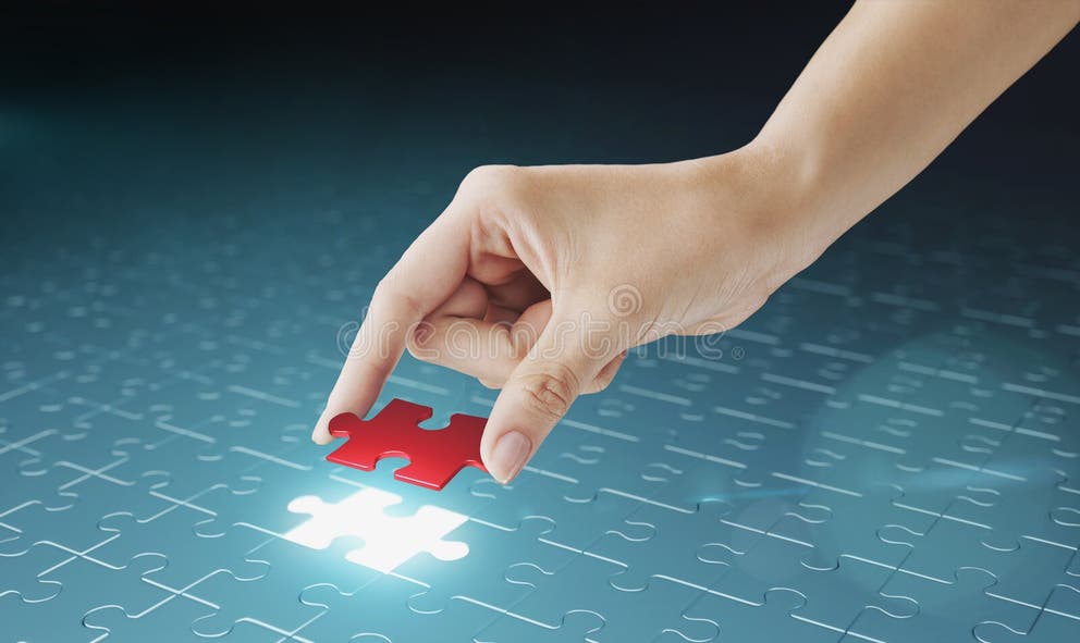 Hand Embed Missing Puzzle Piece into Place. Stock Image - Image of ...