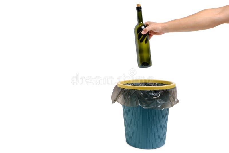 In Hand, an Empty Glass Wine Bottle is Thrown into Trash Stock Photo ...