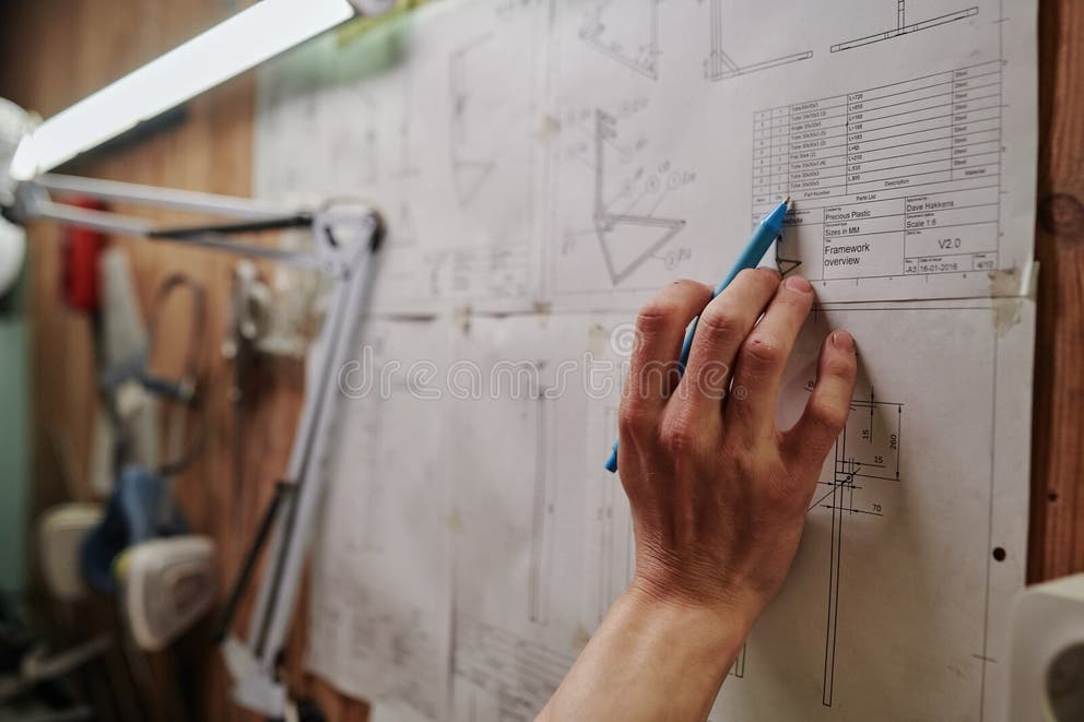 Hand of Engineer Pointing at Table Stock Photo - Image of draft ...