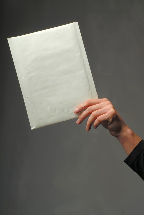 Hand with an envelope stock image. Image of occupation - 2344083