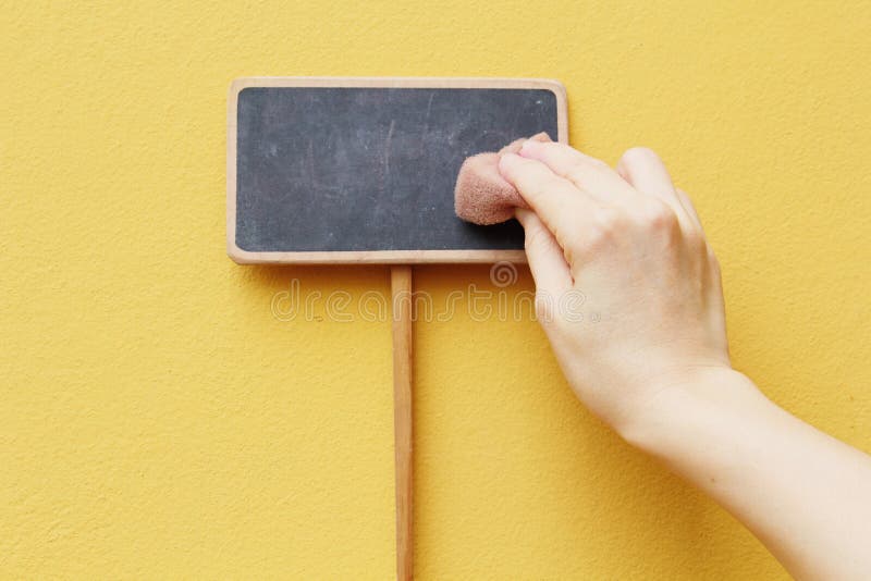 Teacher erasing chalkboard stock image. Image of green - 29287771