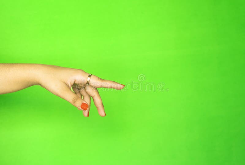 Hand Reaching Forward on Bright Green for Product Mockups Stock Photo ...
