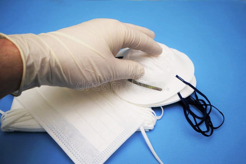 Hand and Face Mask on Blue Background Stock Photo - Image of care ...