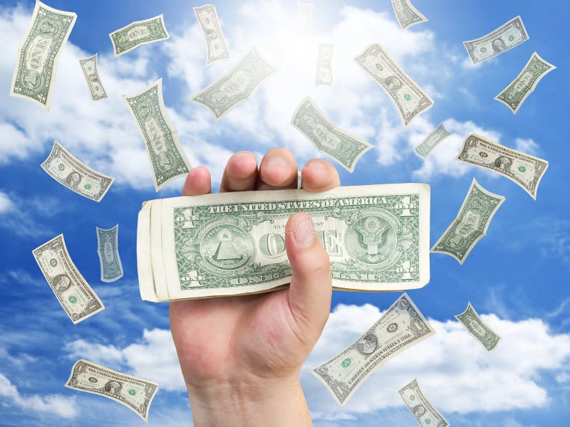 Hand and falling money stock photo. Image of investment - 16573490