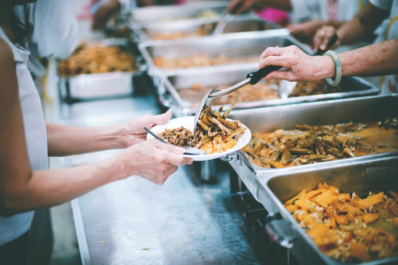 Hand-feeding To the Needy in Society : Concept of Feeding Stock Image ...