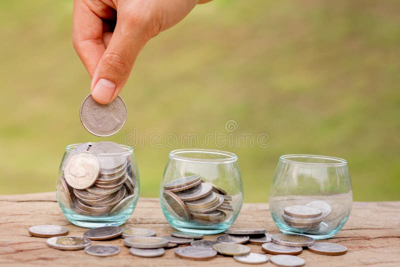 Hand of Female Putting Coins in Jar with Money Stack Step Growi Stock ...