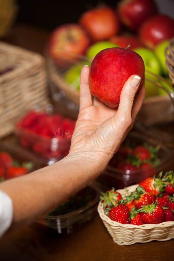 Hand of Female Staff Holding a Apple Stock Photo - Image of natural ...