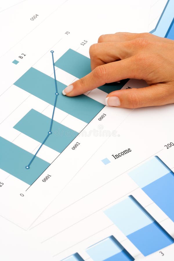 Hand on Financial Graphics. Stock Photo - Image of paperwork, document ...