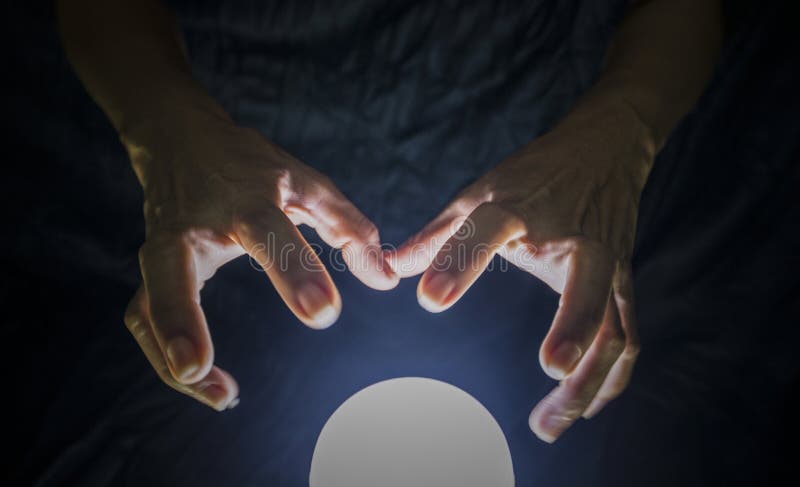 Hand and Finger Gestures Show Magic on Black Background with Light and ...