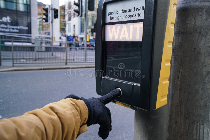 Hand Finger Pressing or Pushing on Stop Request Button at Crosswalk ...