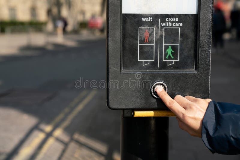 Hand Finger Pressing or Pushing on Stop Request Button at Crosswalk ...