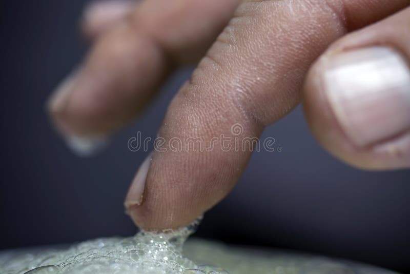 Hand and Finger Touching Soap Bubble. Close-up Stock Image - Image of ...
