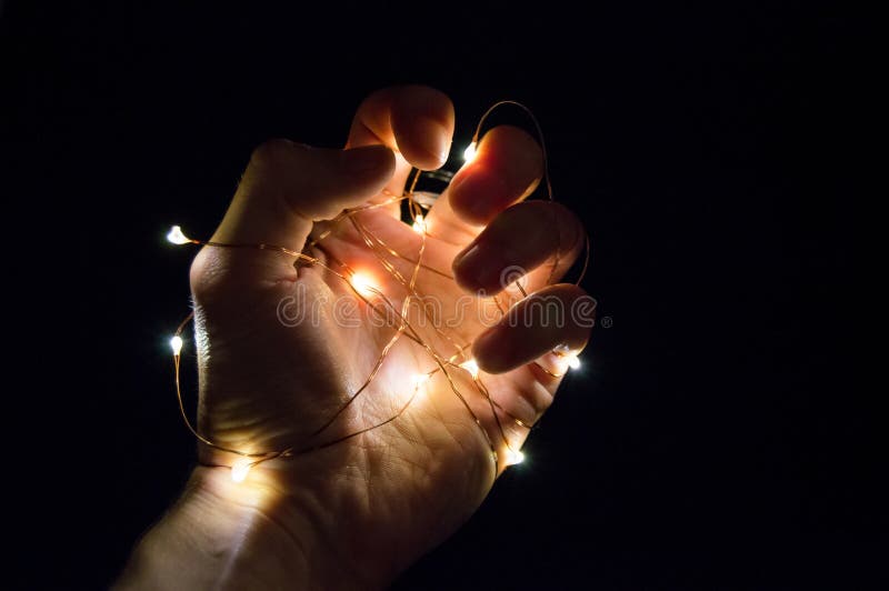 Hand in Fist Tangled Up in a Glowing Copper Wire Stock Image - Image of ...