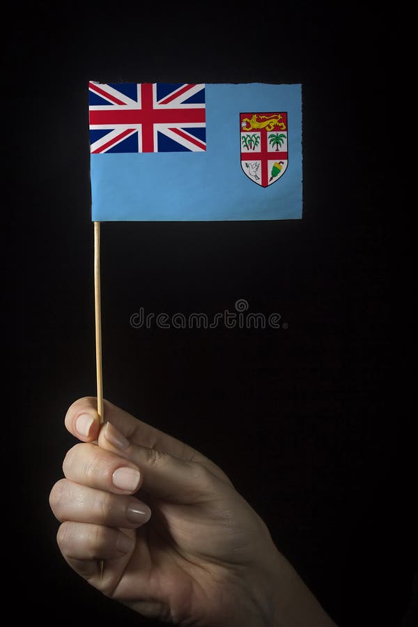 Hand with Flag of Fiji stock image. Image of white, patriotism - 180873639