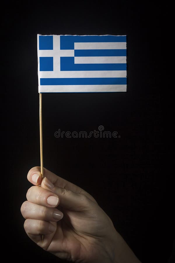 Hand with flag of Greece stock photo. Image of unity - 187823950