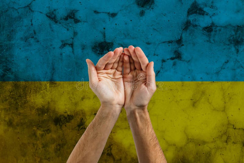 Hand of the Flag of Ukraine and Blood. No War and Peace Concept. Stock ...