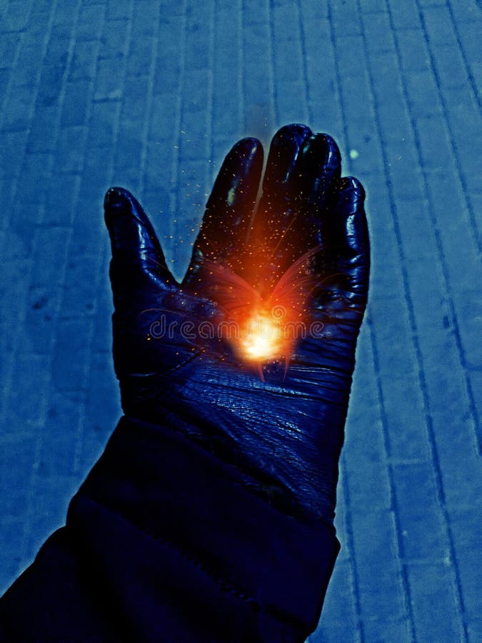 Hand with flaming fire stock photo. Image of ball, hand - 136607632