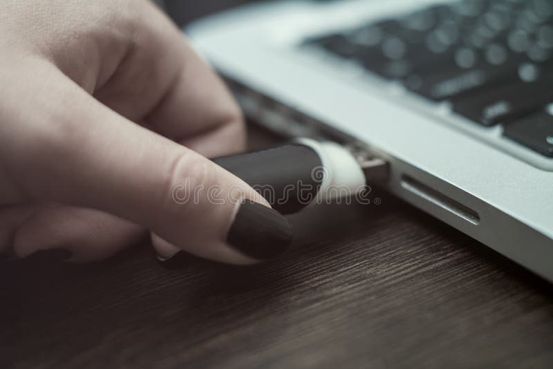 Hand with flash drive stock photo. Image of computer - 70623190