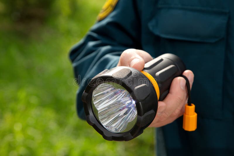 Hand with flashlight stock image. Image of light, rescuer - 11072641