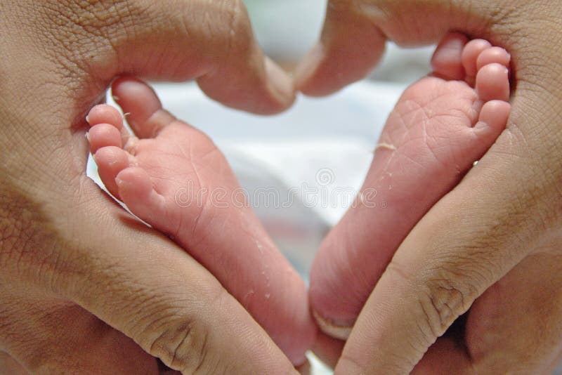 Hand foot love, Bayb foot and father hand with