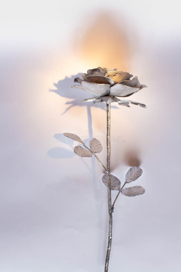 Hand Forged Rose. Rose Handmade Forged from Metal on a White Back Stock ...