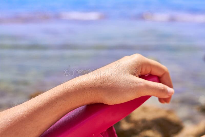 Hand in front of the beach stock photo. Image of girl - 121521440