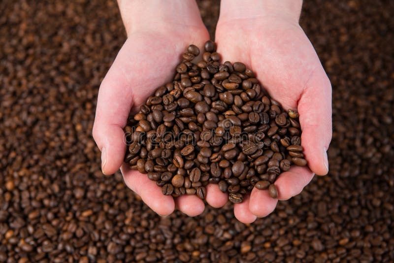 A hand full coffee stock photo. Image of drink, crema - 39089428